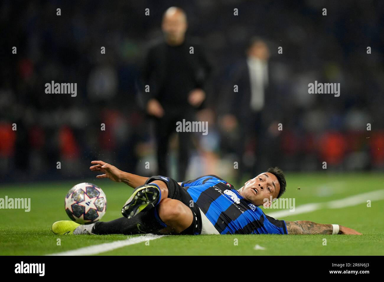 Inter Milan's Lautaro Martinez fails to stop the ball going over the ...
