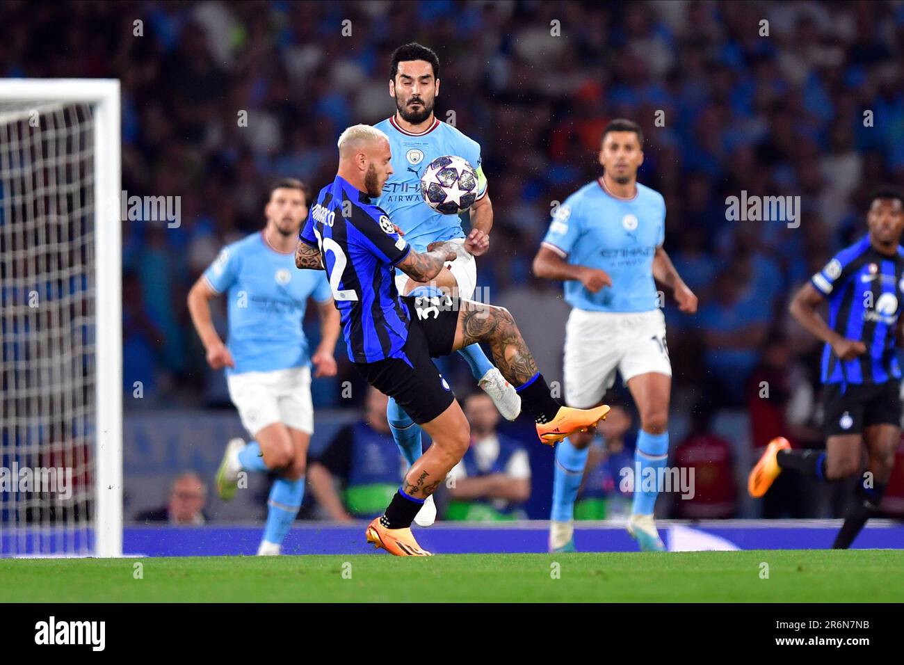 Istanbul, Turkey. 10th June, 2023. Ilkay Gundogan (8) of Manchester City and Federico Dimarco ...
