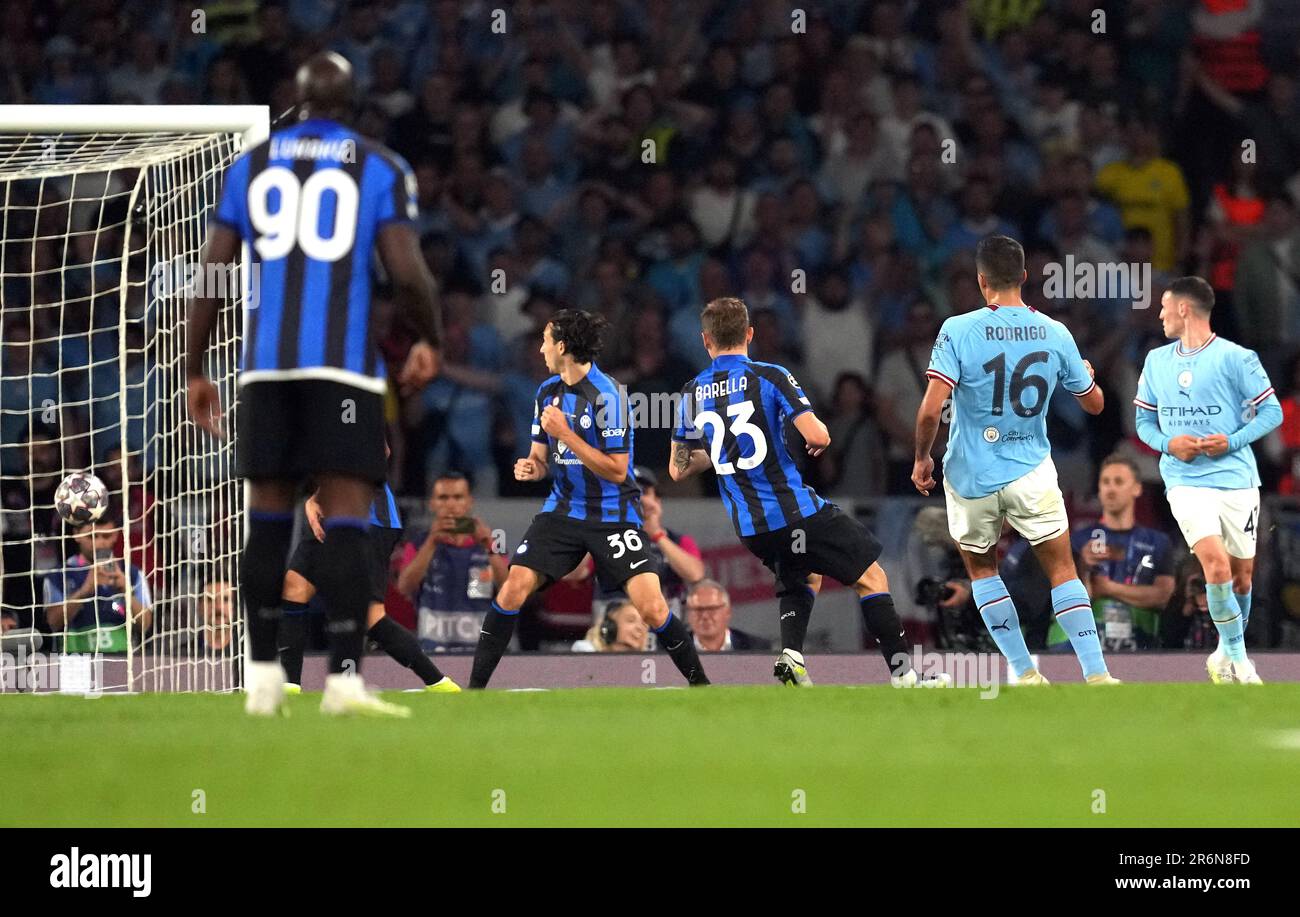 Manchester City's Rodri (second right) scores their side's first goal ...