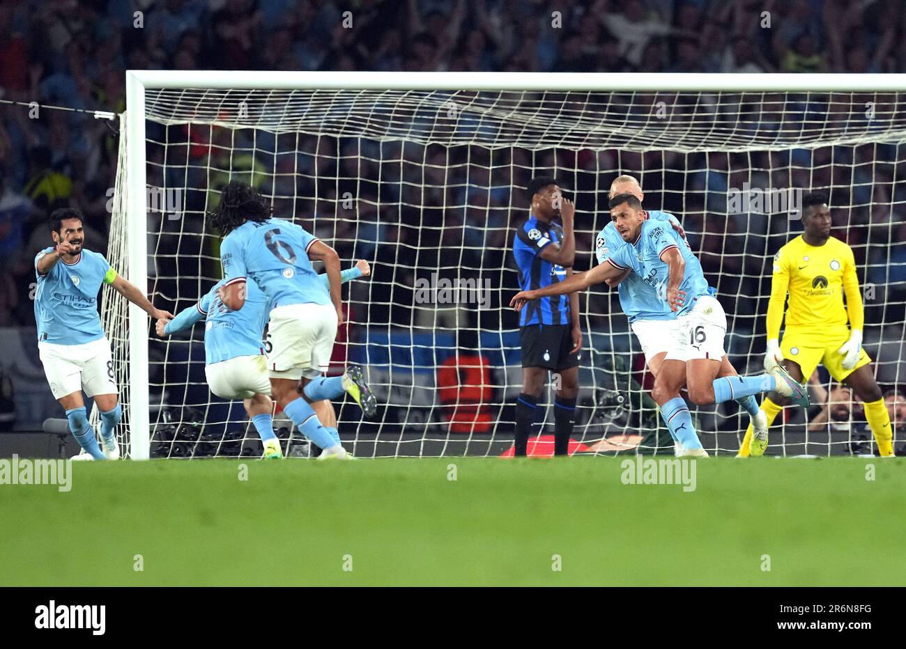 Manchester City's Rodri (second right) celebrates scoring their side's ...