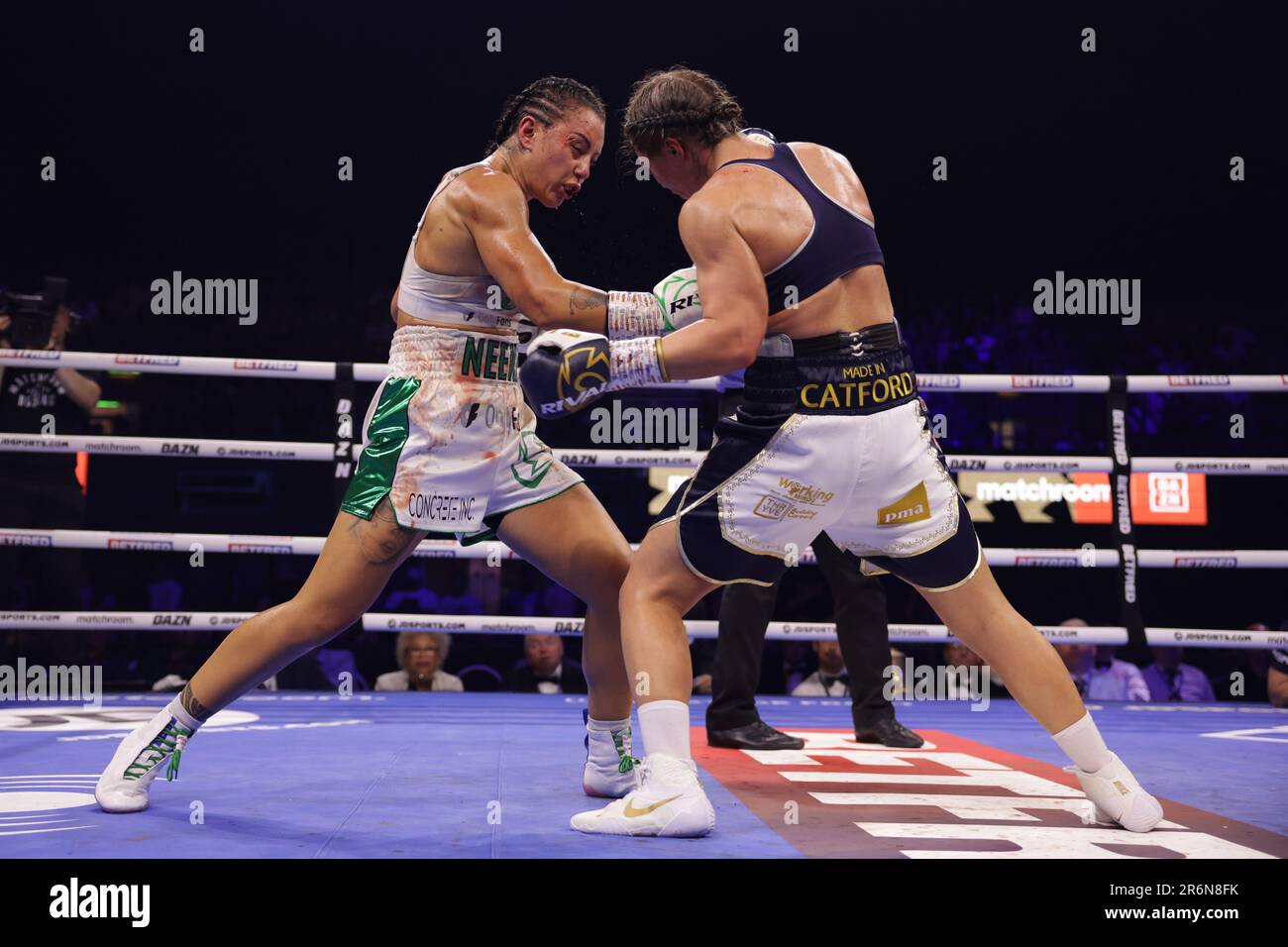 Ellie Scotney (right) hits out at Cherneka Johnson during the IBF Super ...