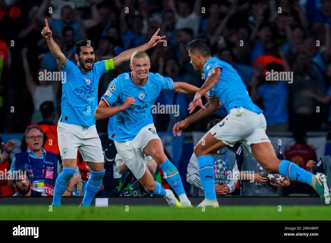 Manchester City's Rodrigo, right, celebrates after scoring his side's ...