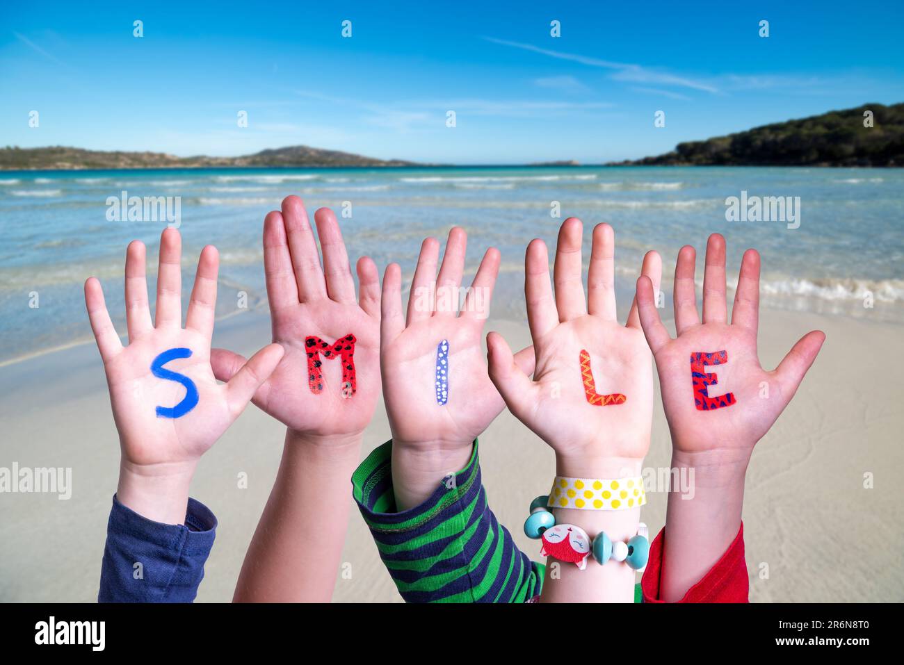 Children Hands Building Word Smile, Ocean And Sea Stock Photo - Alamy
