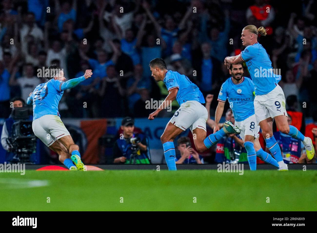 Manchester City's Rodrigo, second left, celebrates after scoring his ...