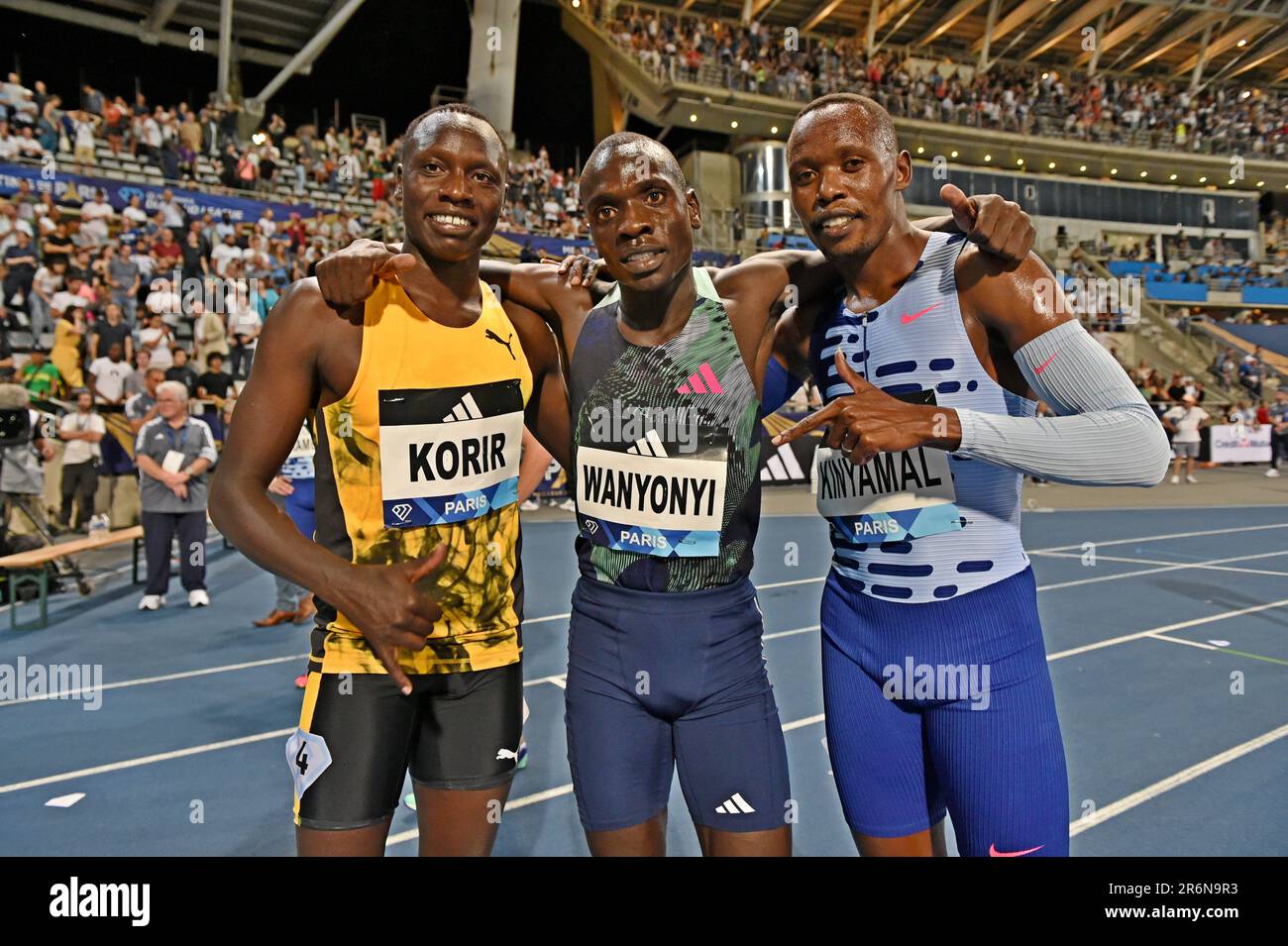 Emmanuel Wanyonyi (KEN, center, poses with Wyclife Kinyamal (KEN ...
