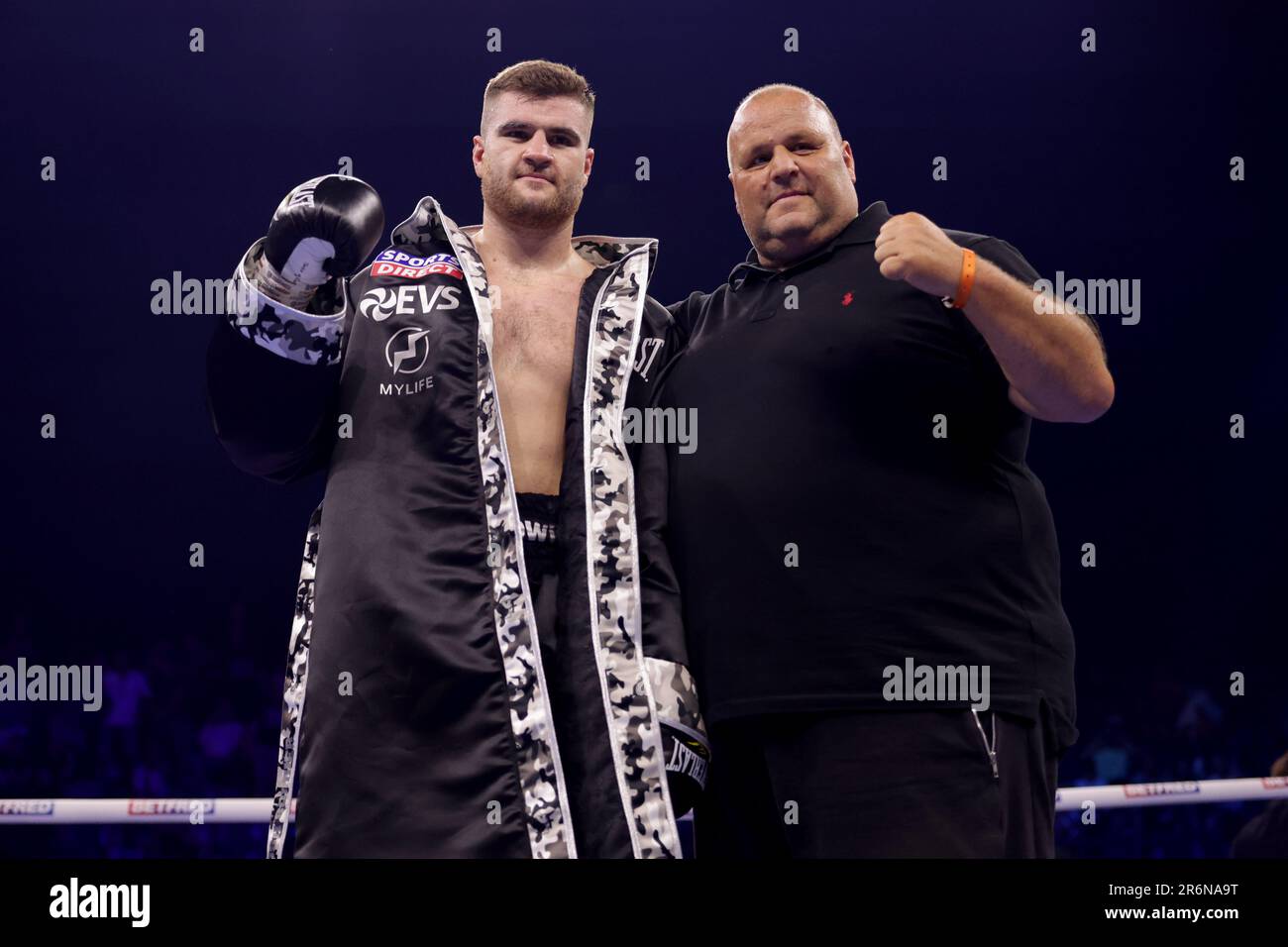 Johnny Fisher (left) poses following the International Heavyweight ...