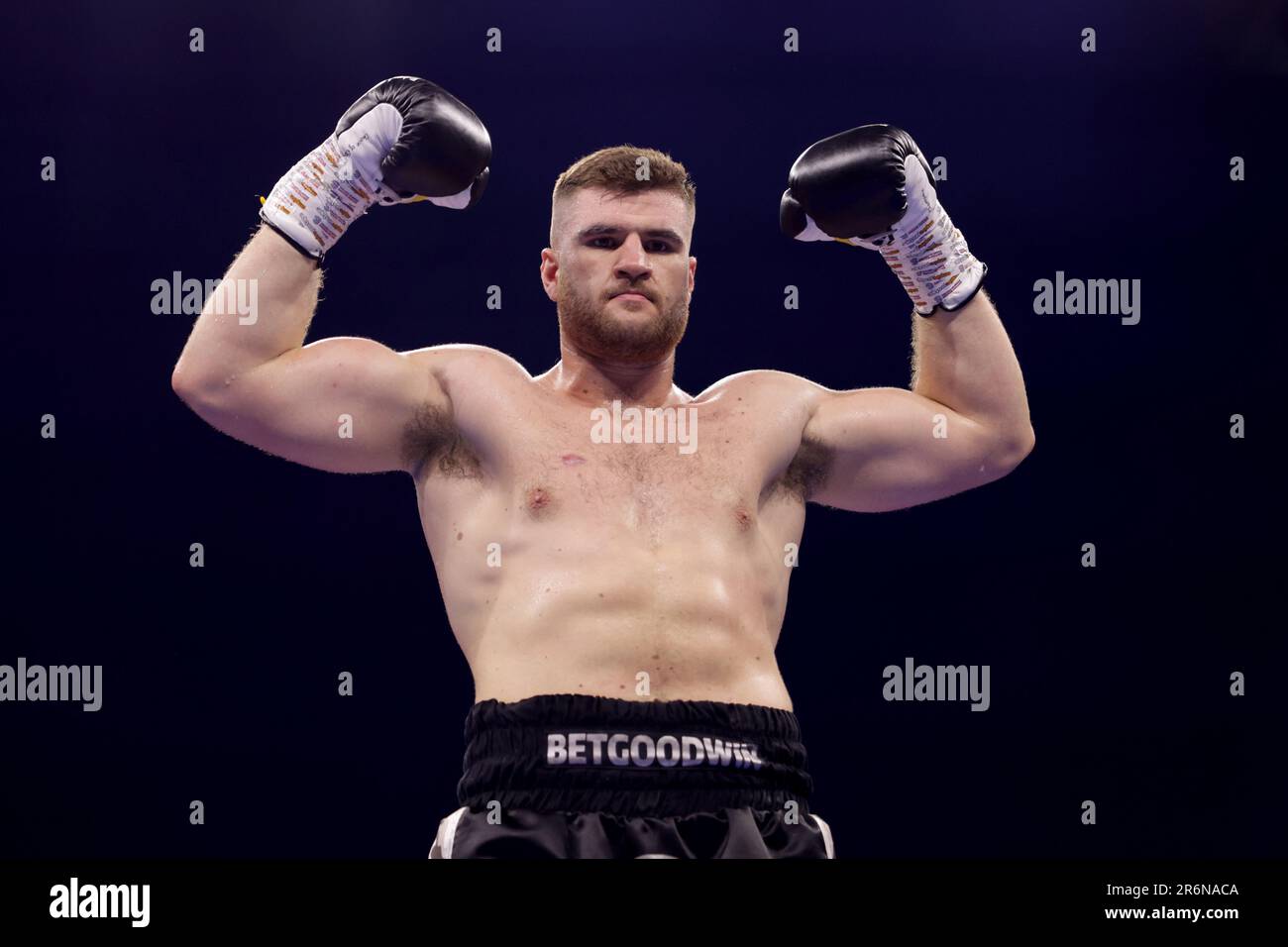 Johnny Fisher poses following the International Heavyweight match at ...