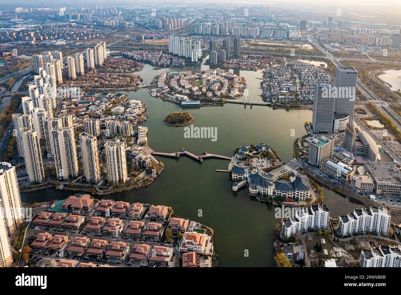 Aerial view of a vast blue body of water surrounded by a sprawling ...
