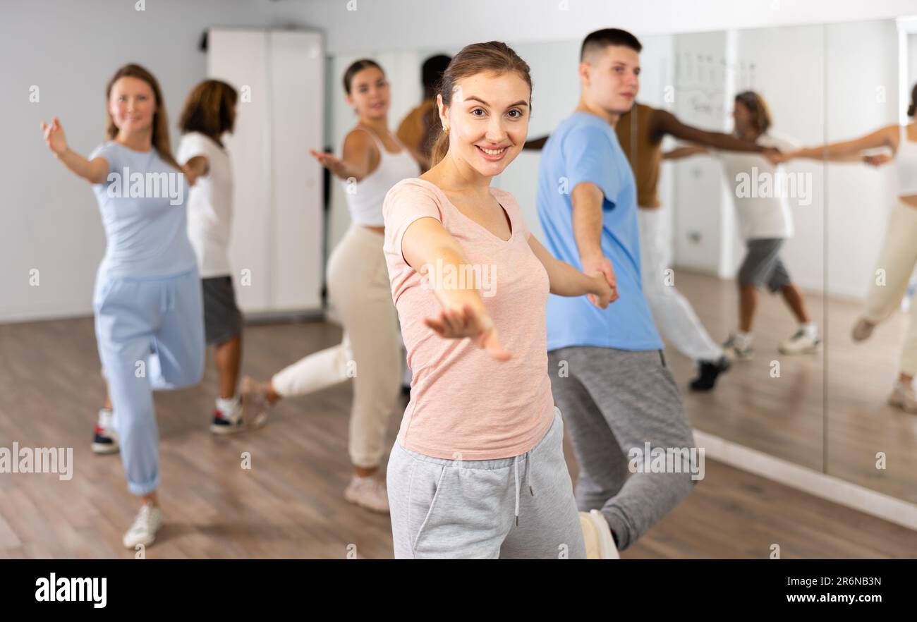 Young girl and teen boy dancing pair dance Stock Photo - Alamy