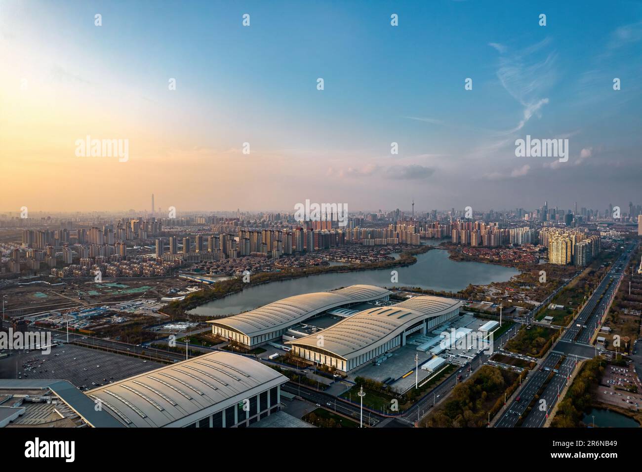A stunning image of an Asian city skyline at sunset, taken from the top ...