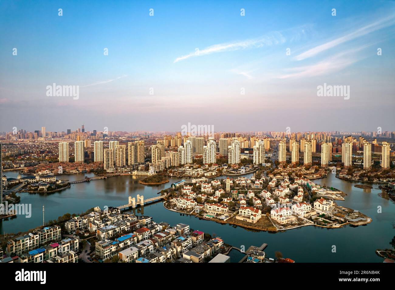 A high-angle view of a bustling metropolis, with a complex network of ...