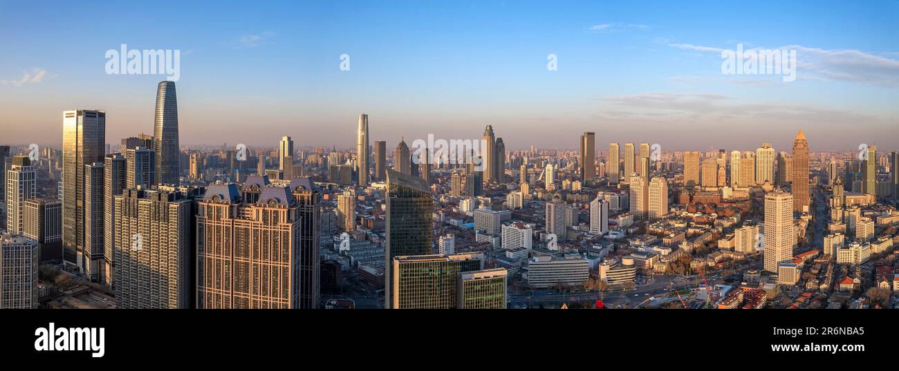 Aerial view of a bustling metropolis with an abundance of high-rise buildings in the background ...
