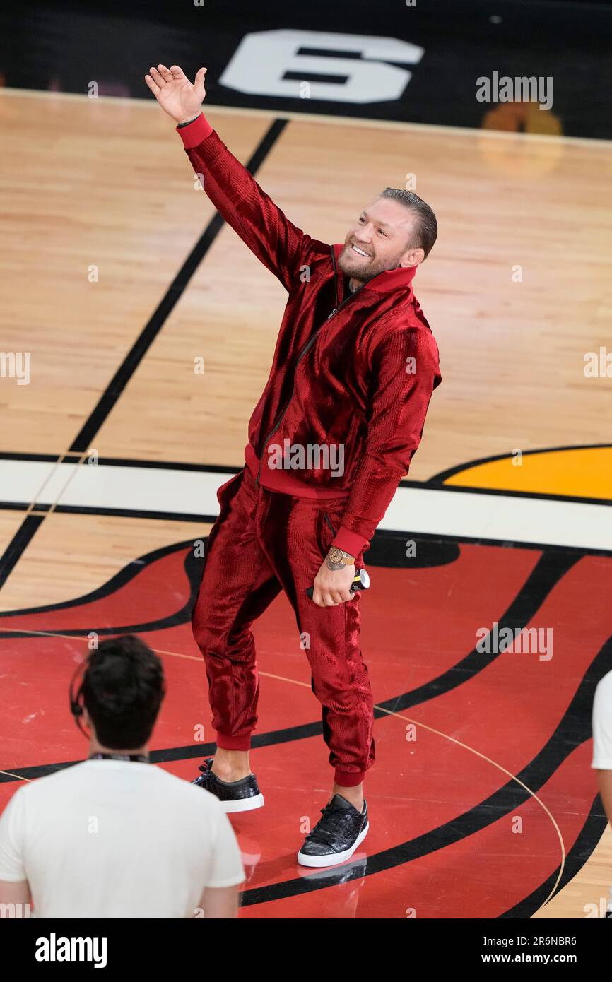 MMA fighter Conor McGregor speaks during a break in Game 4 of the ...