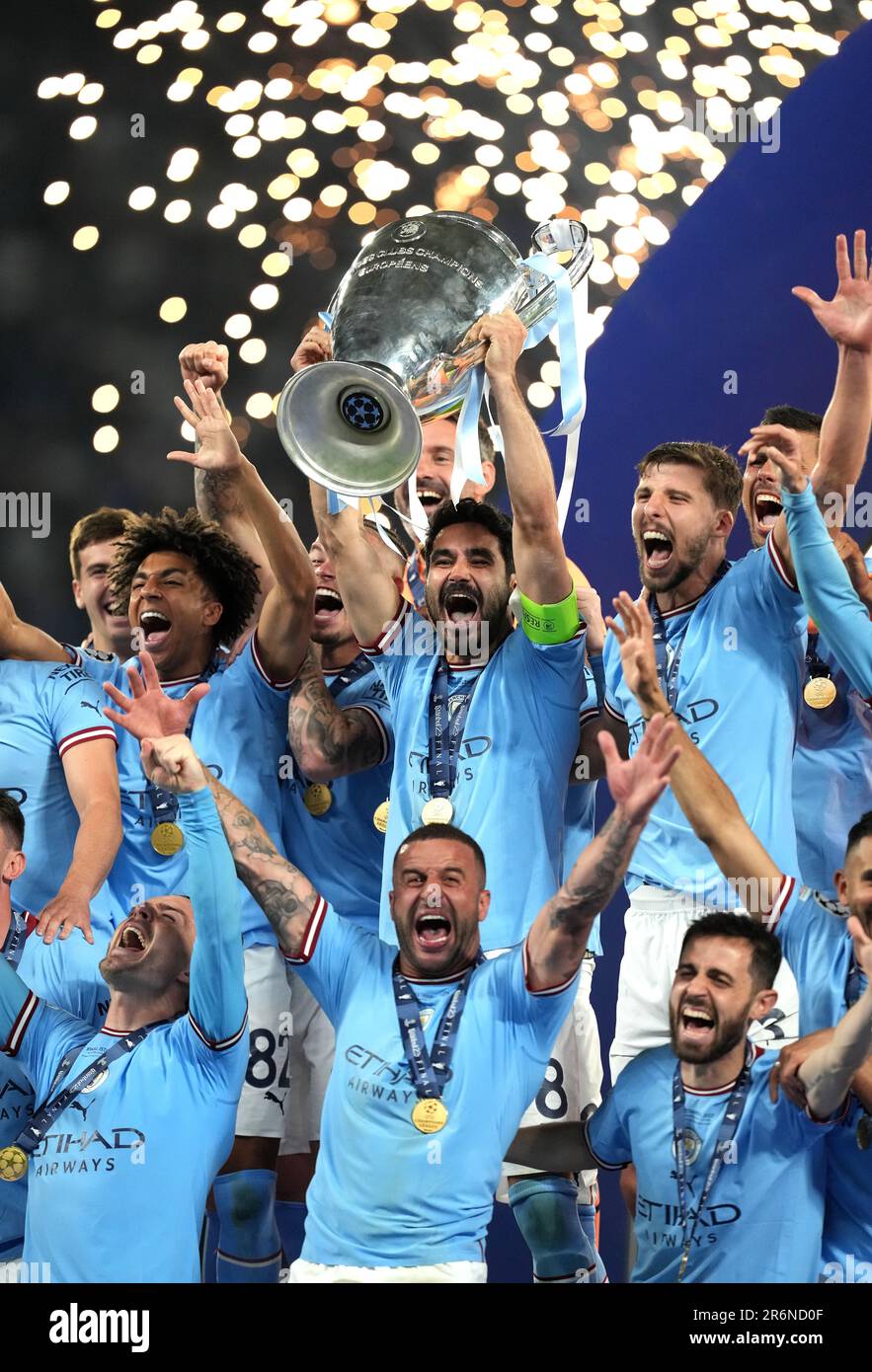 Manchester City's Ilkay Gundogan lifts the UEFA Champions League Trophy ...