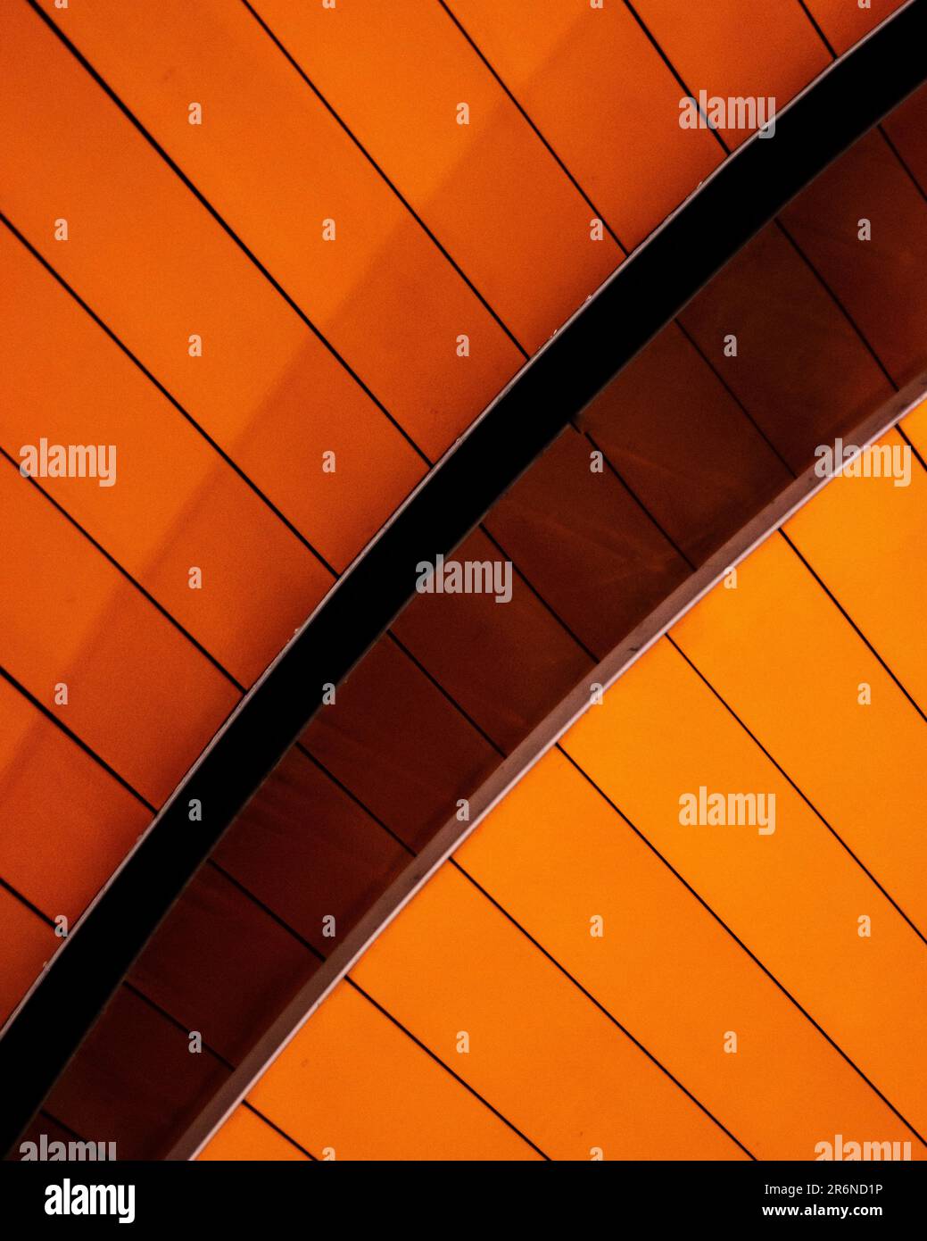 An orange ceiling in a modern building Stock Photo - Alamy