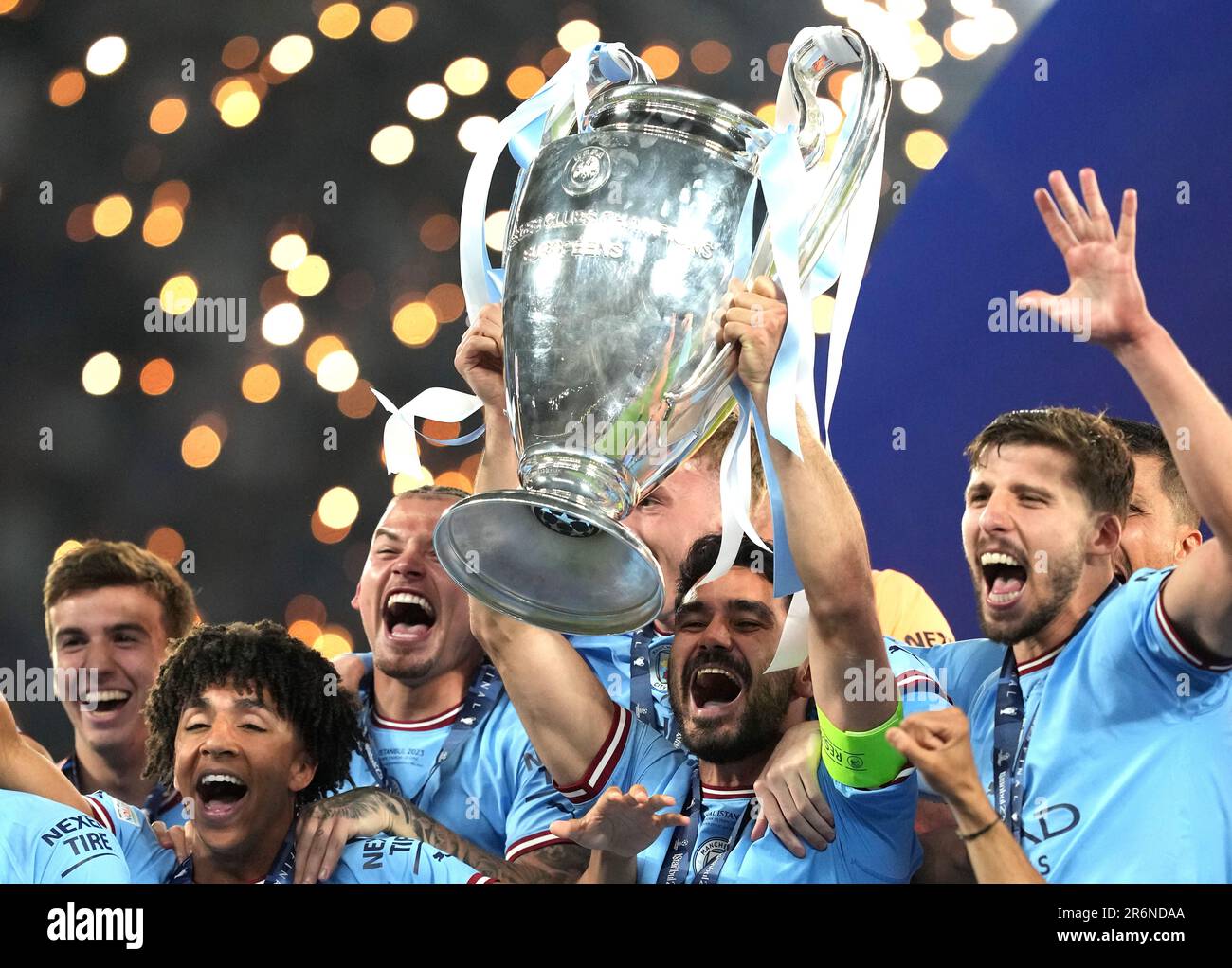 Manchester City's Ilkay Gundogan lifts the UEFA Champions League Trophy ...