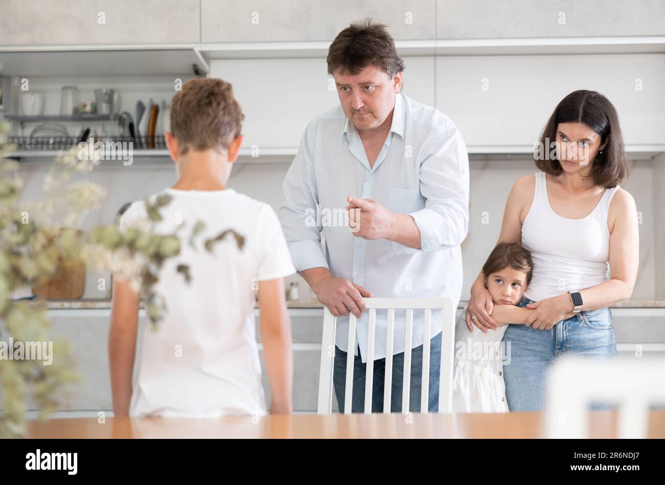Father scolding son and daughter hi-res stock photography and images ...