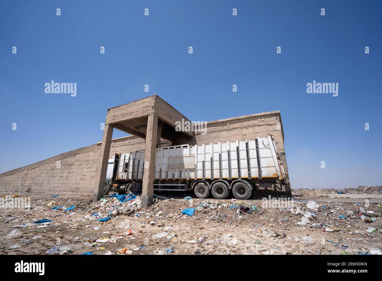Garbage truck and garbage in the city dump Stock Photo - Alamy