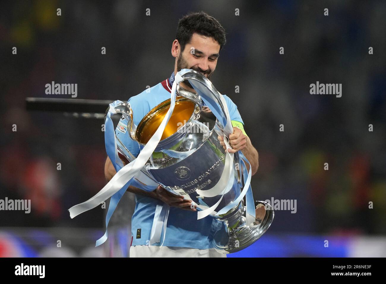 Manchester City's Ilkay Gundogan holds the trophy after the Champions ...