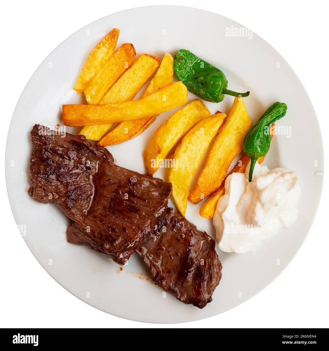 Baked mutton pieces, potato and pepper Stock Photo - Alamy