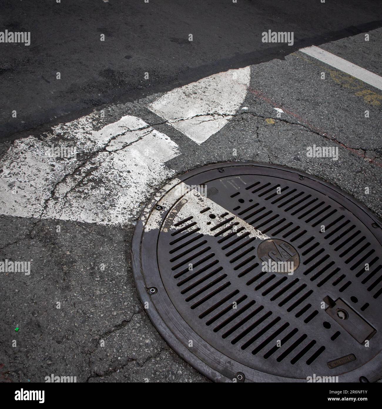 Exploring Chinatown in San Francisco, California. An arrow and a grate ...