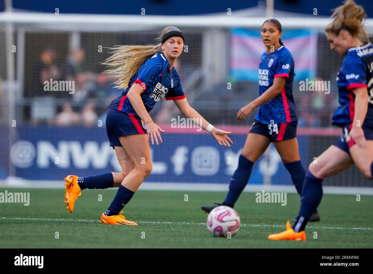 OL Reign forward Bethany Balcer (8) looks on with forward Elyse Bennett ...
