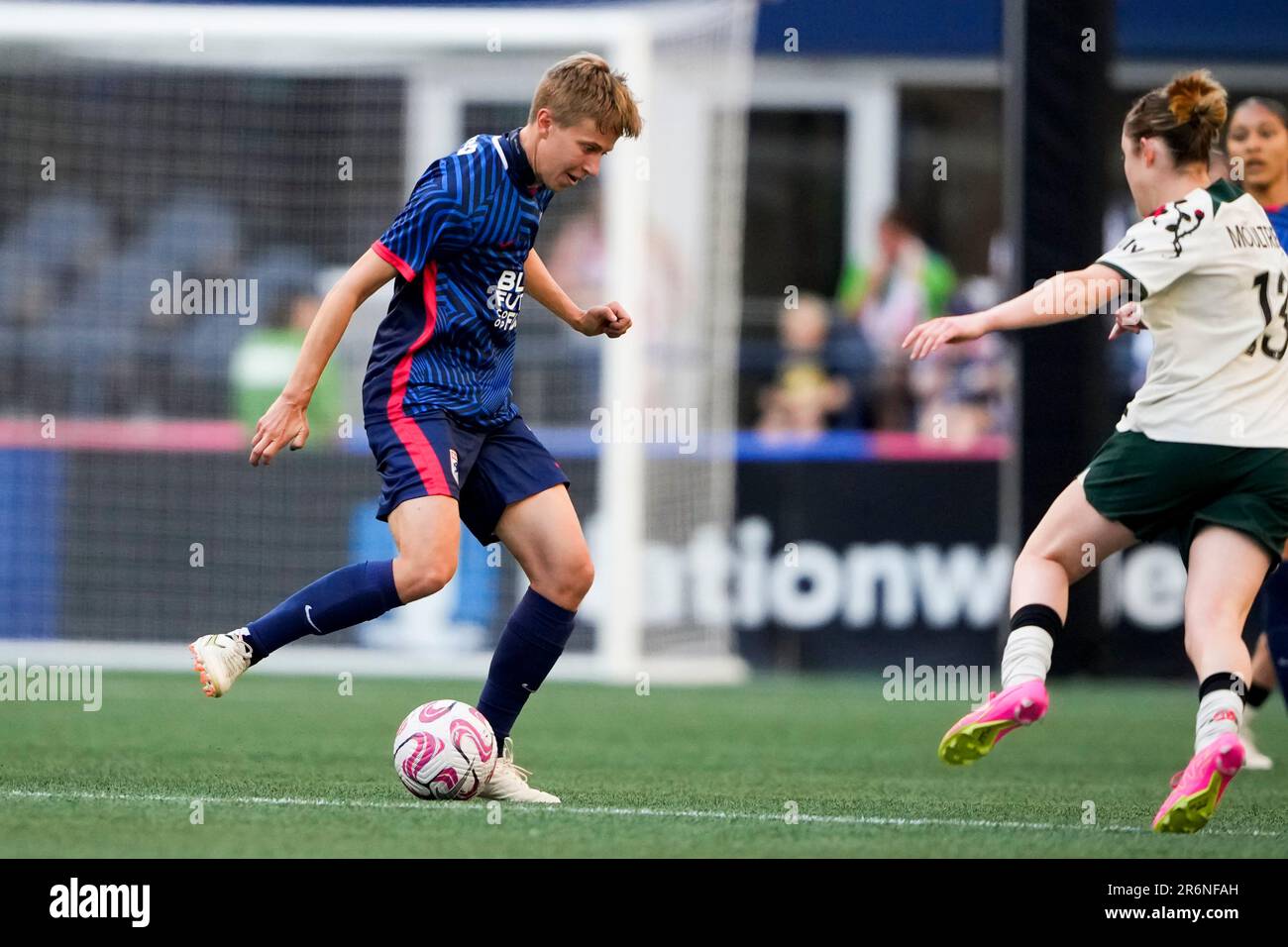 OL Reign midfielder Quinn (5) moves the ball against Portland Thorns ...