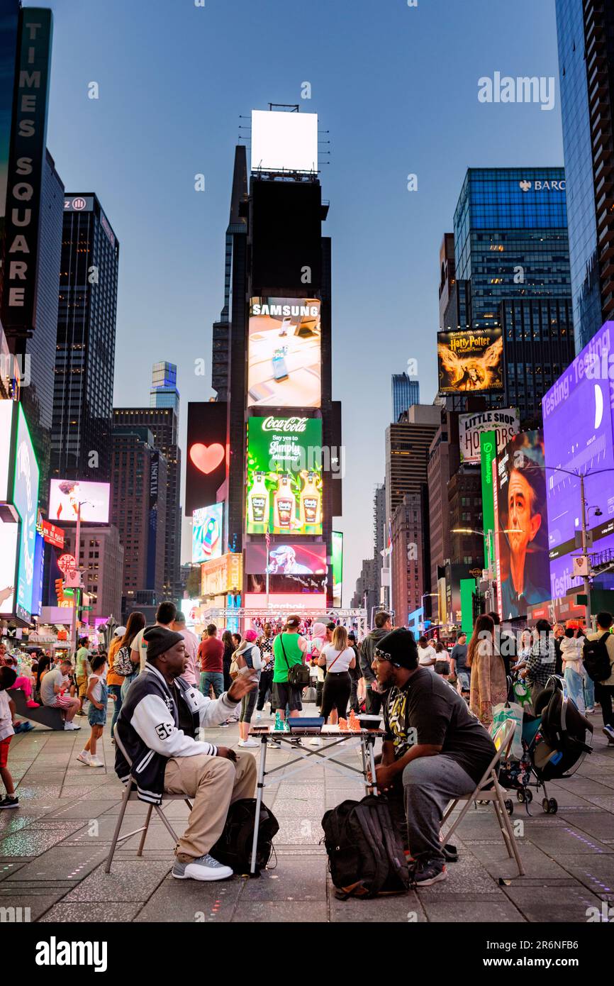 A quiet game of chess in Times Square whilst the world buzzes by around ... A quiet game of chess in Times Square whilst the world buzzes by around ...