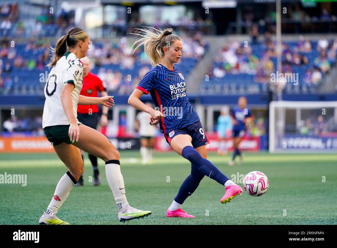 OL Reign forward Jordyn Huitema (9) passes the ball against Portland ...