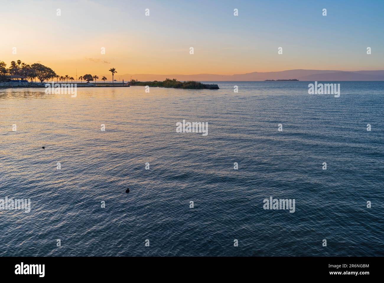 dawn breaks on lake horizon in chapala jalisco mexico Stock Photo - Alamy