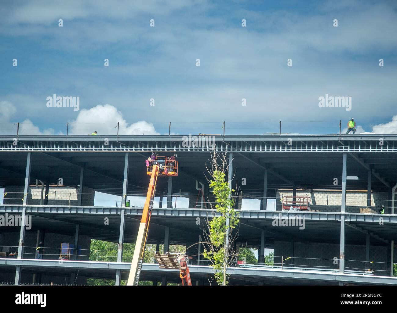 Workers working on the construction of a new office building Stock ...