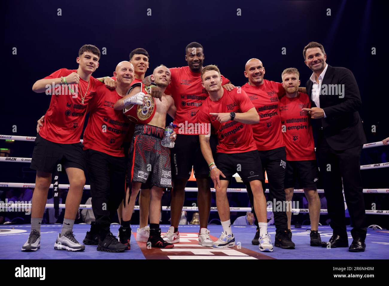 Sunny Edwards (fourth from left) poses with his belt, his coaching team ...