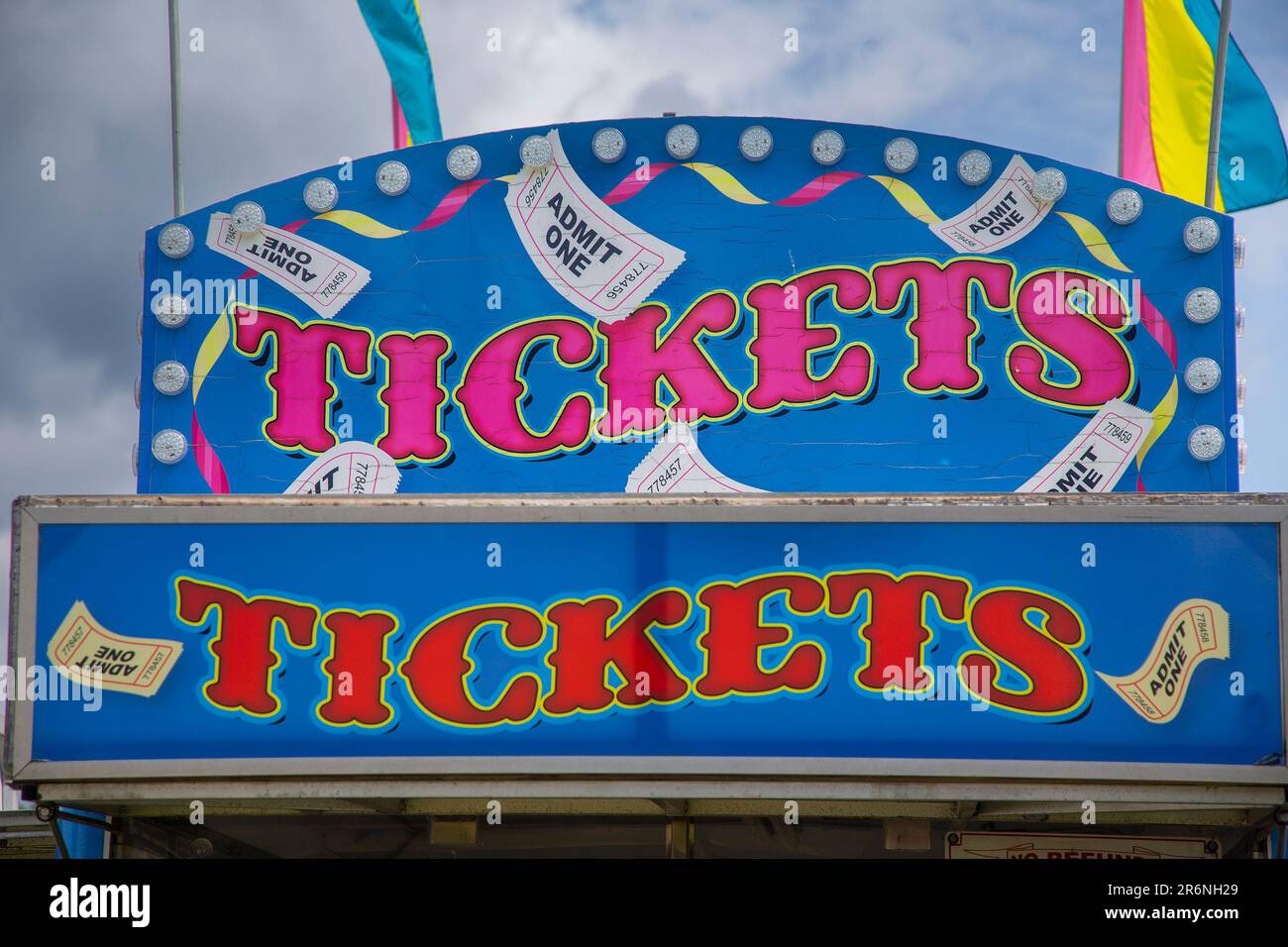 Sign over a ticket booth at a carnival Stock Photo - Alamy