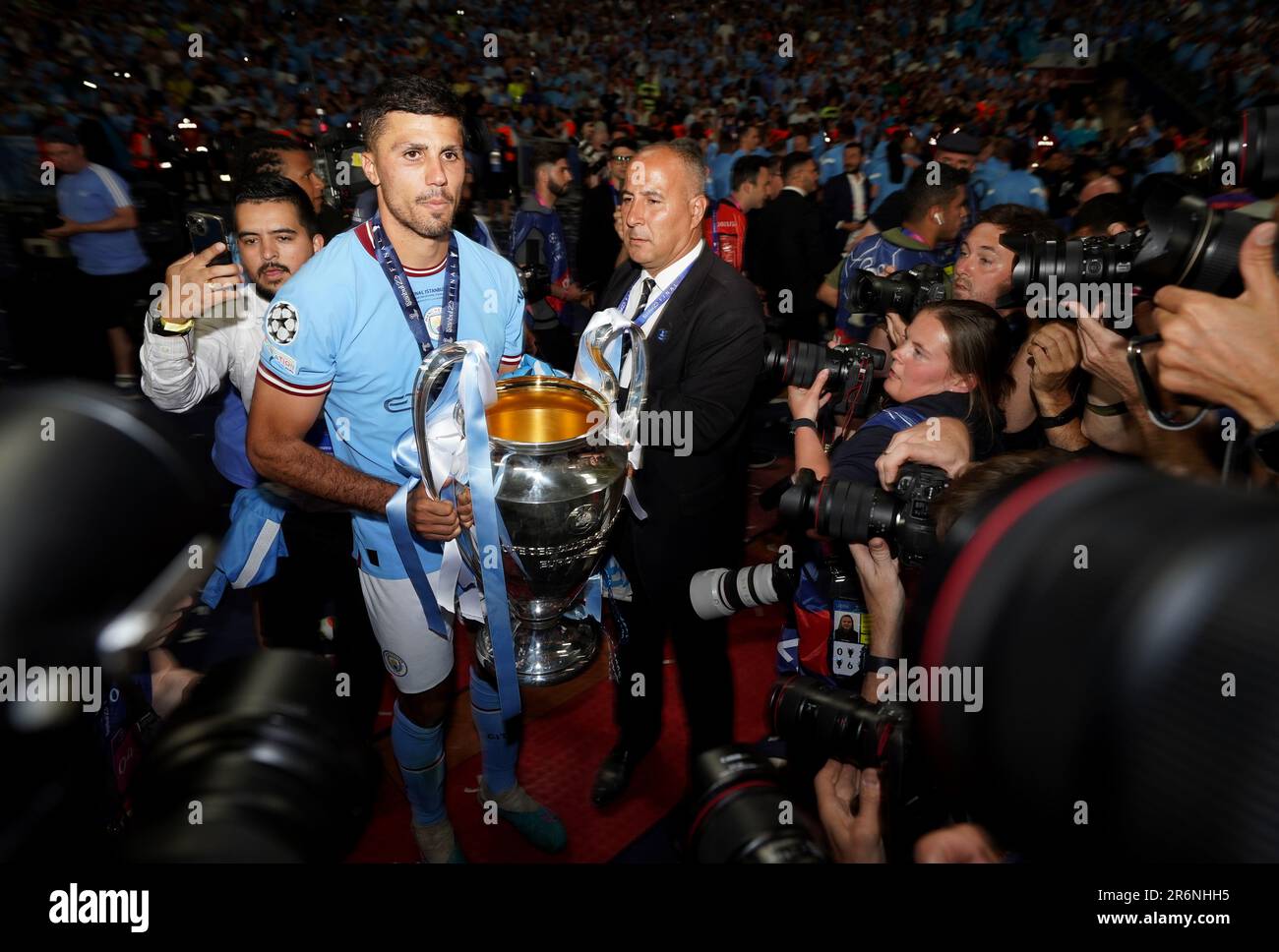 Manchester City's Rodri with the UEFA Champions League Trophy following ...