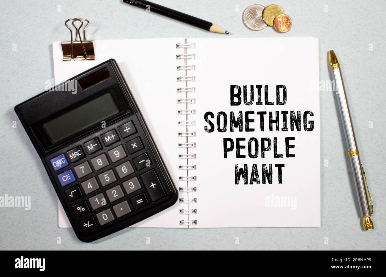 Build something people want.text on white notepad on craft background ...