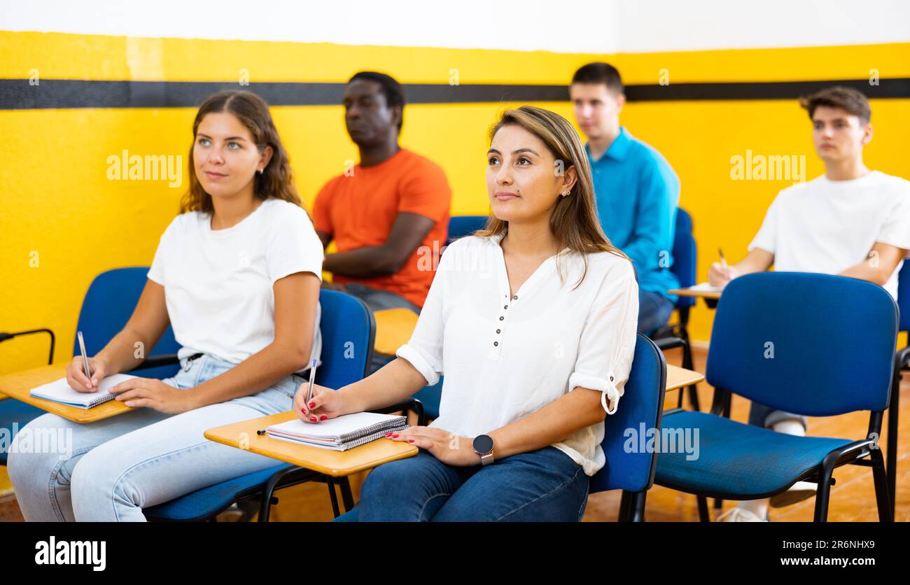 Portrait of group of people in lecture hall at extension courses Stock ...