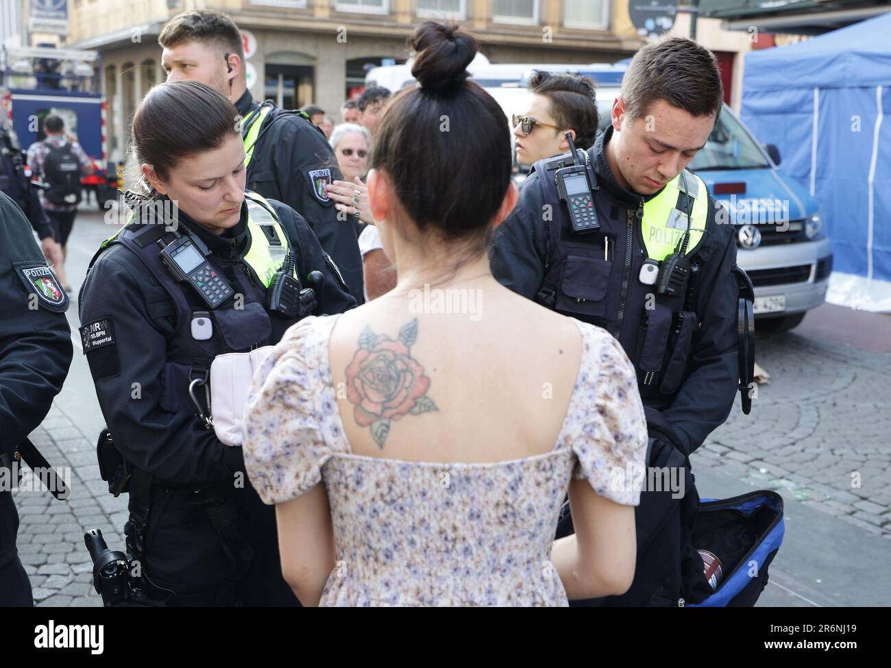 Duesseldorf, Germany. 10th June, 2023. Police officers search a woman's ...
