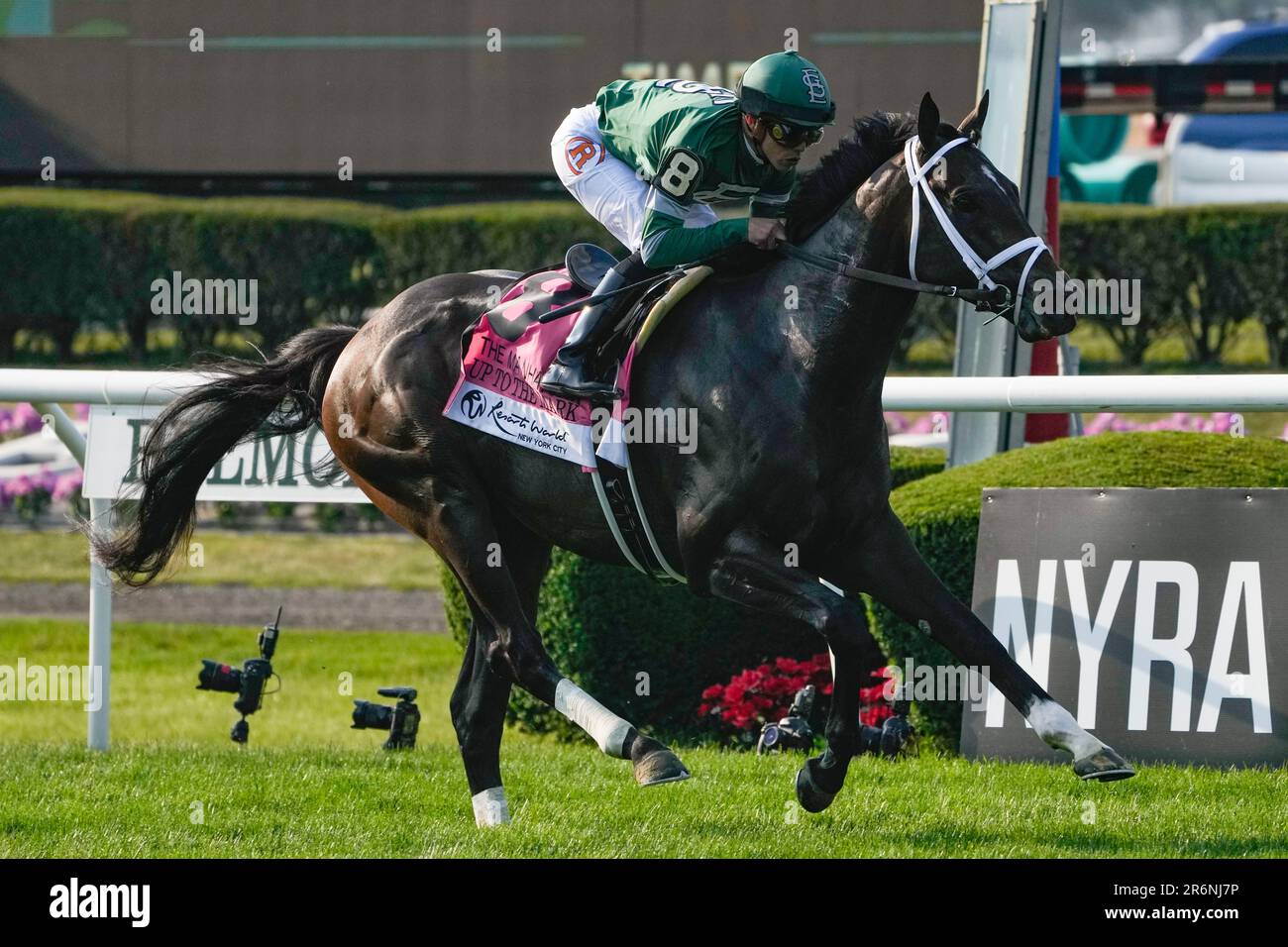 Up to the Mark, with jockey Irad Ortiz, crosses the finish line to win ...
