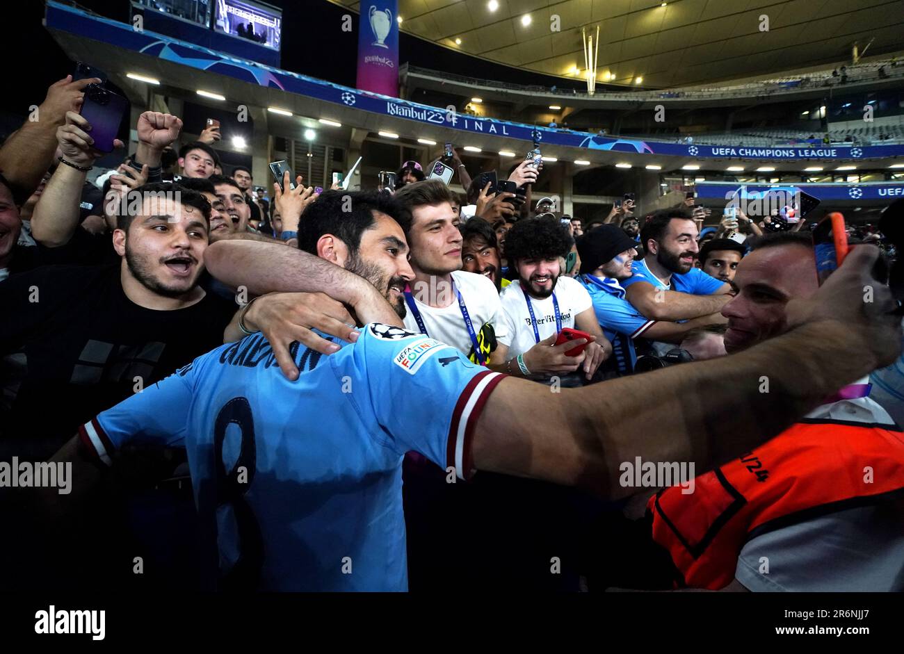 Manchester City's Ilkay Gundogan take selfies with fans following ...
