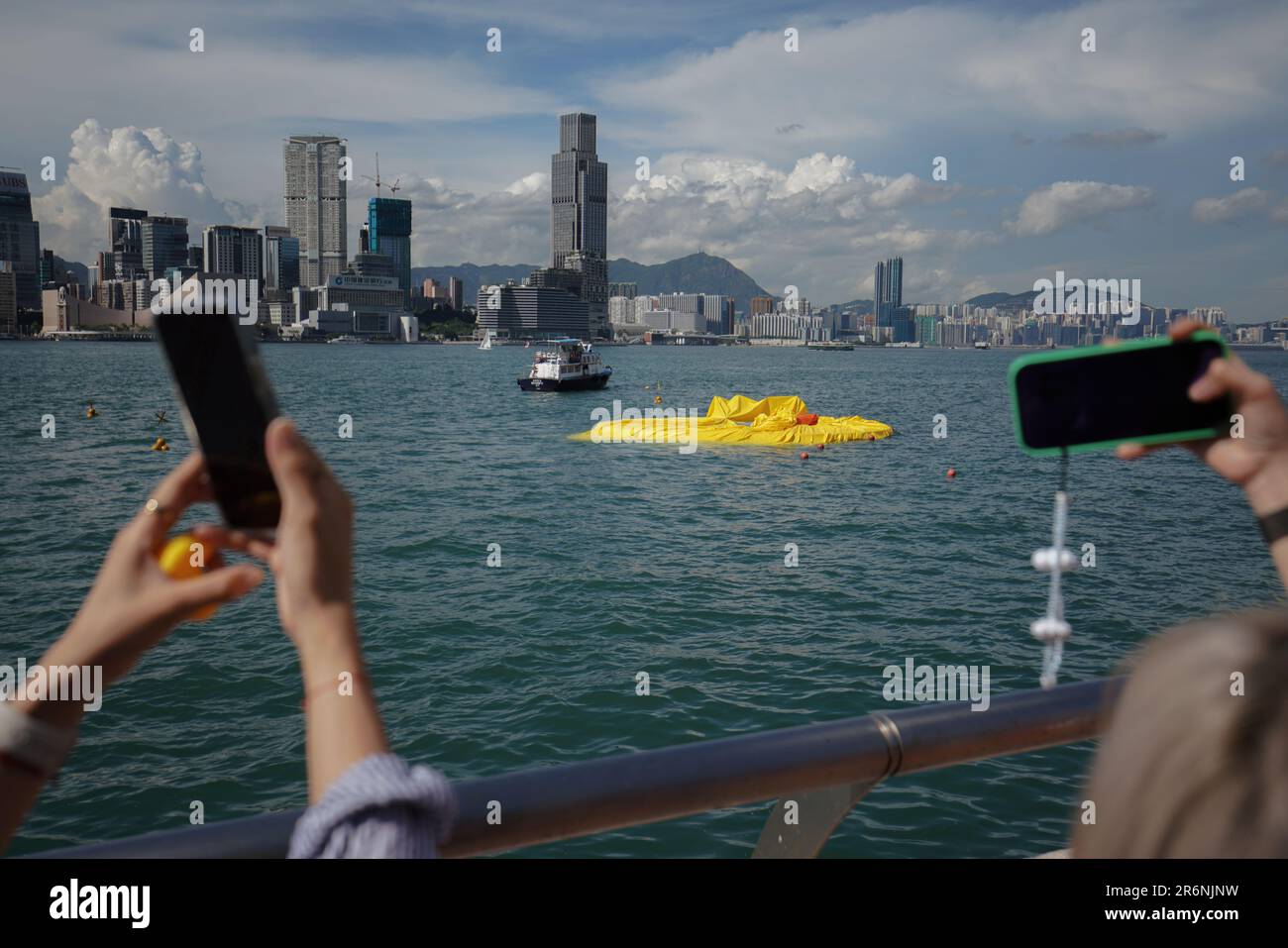 Hong Kong. 10th June 2023. People take photos of a deflated enormous ...