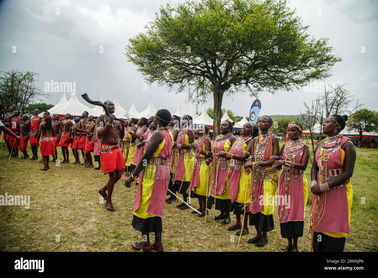 Narok, Kenya. 10th June, 2023. Maasai men and women wearing their traditional attires dance and ...