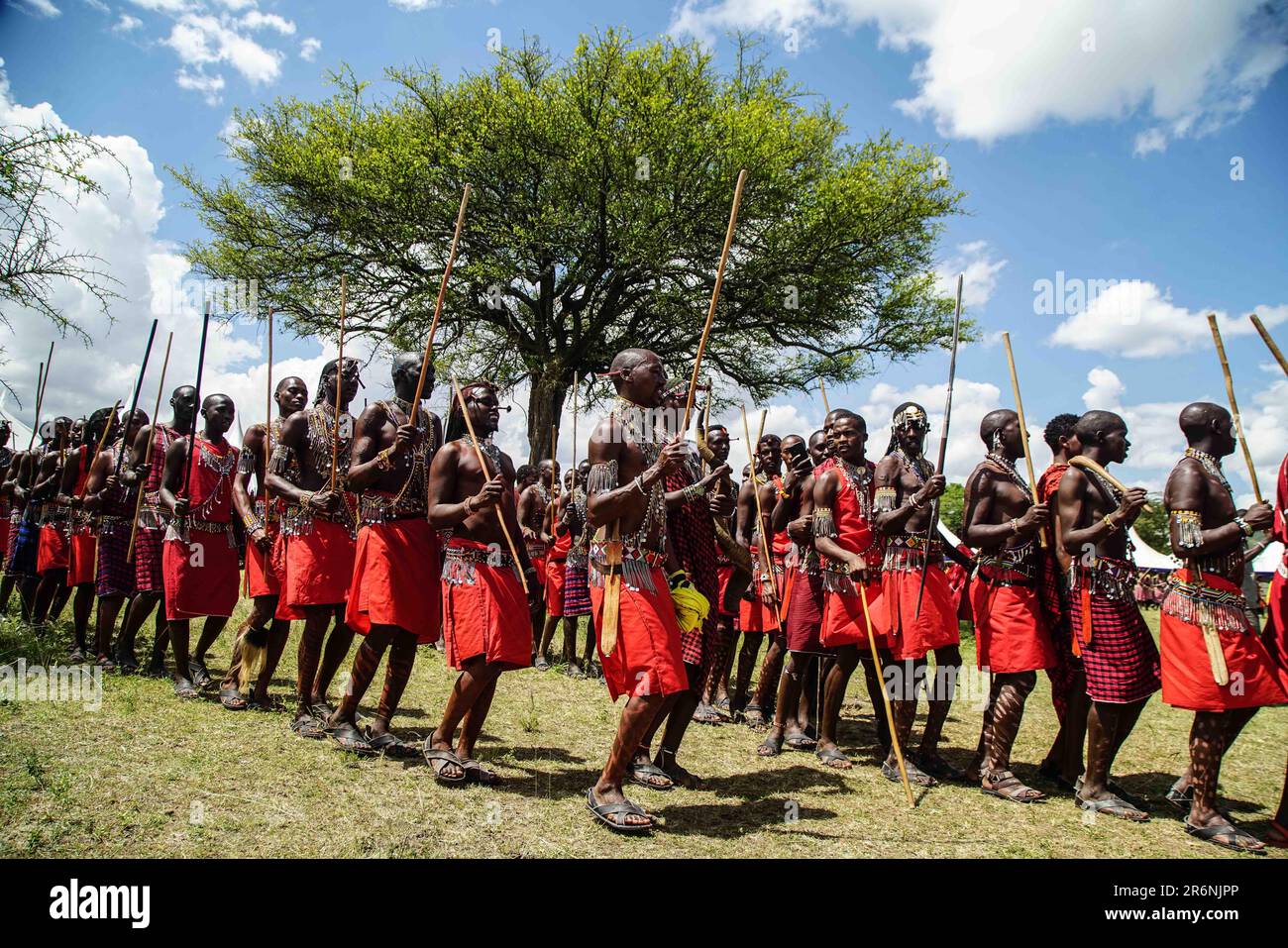 Narok, Kenya. 10th June, 2023. Maasai men wearing their traditional attires dance and sing ...