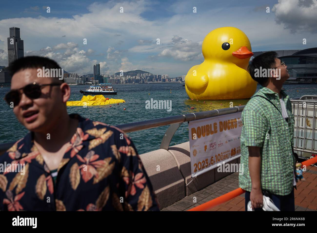 An enormous inflatable duck stations at Victoria Harbour while one is ...