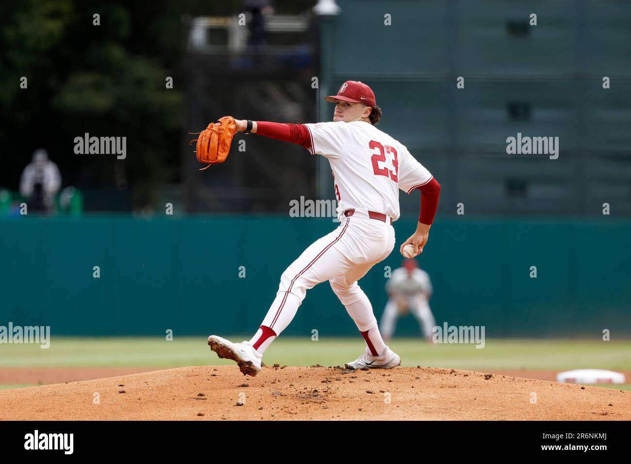 Stanford's Joey Dixon (23) throws the first pitch against Texas in the ...
