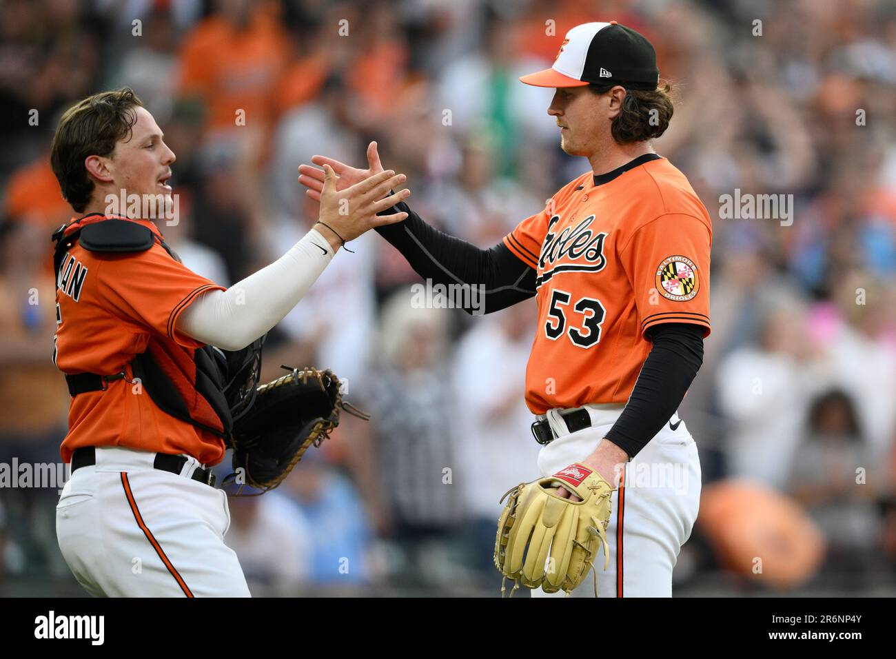 Baltimore Orioles relief pitcher Mike Baumann (53) and catcher Adley ...