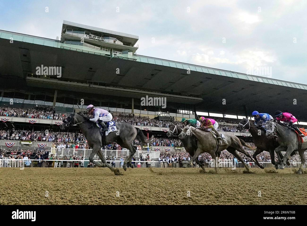 Arcangelo, with jockey Javier Castellano, left, crosses the finish line ...