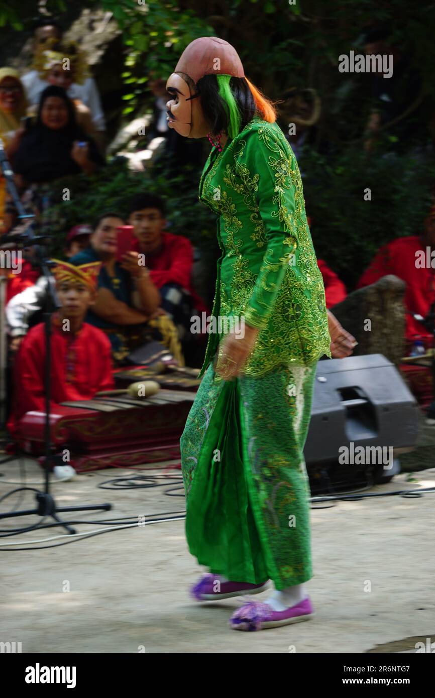 DidiK Nini Towok Performs dance on selomangleng performance art. He is ...