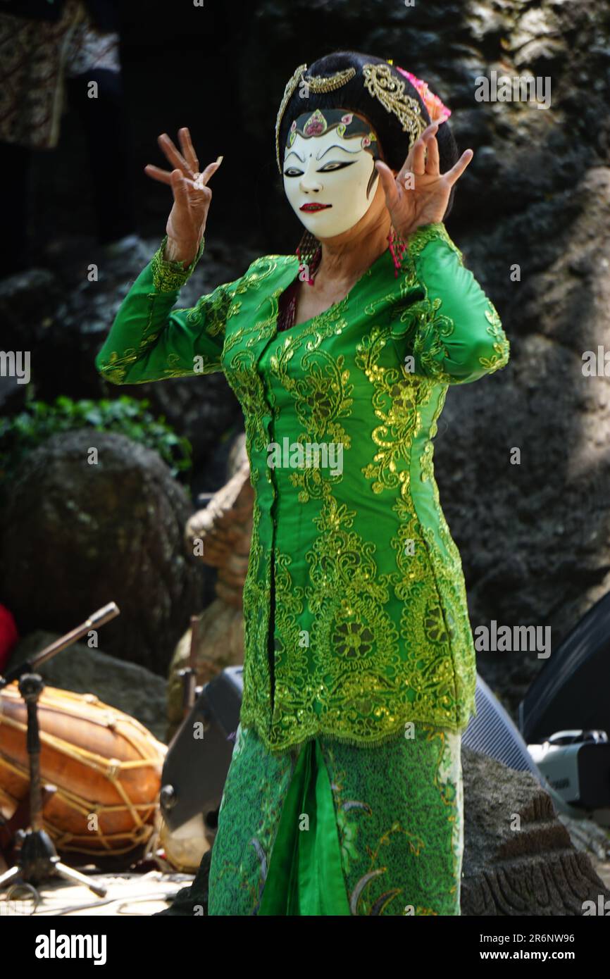 DidiK Nini Towok Performs dance on selomangleng performance art. He is ...