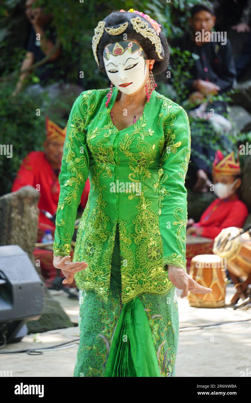 DidiK Nini Towok Performs dance on selomangleng performance art. He is ...