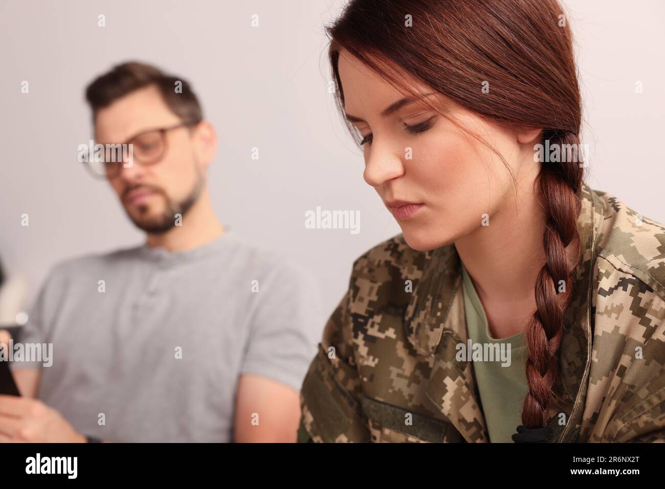 Woman in military uniform sitting hi-res stock photography and images ...